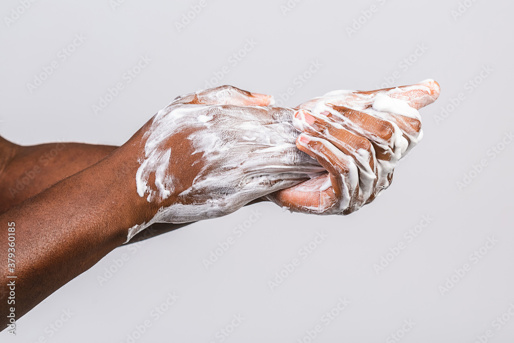 Black african american man washing hands isolated on white background ...