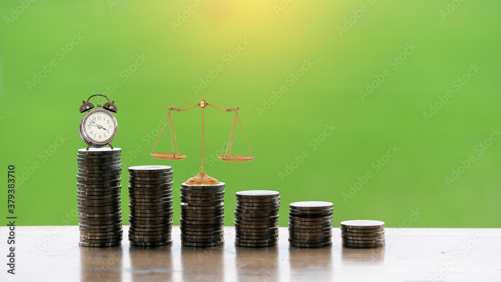 A stack of coins arranged in a graph of business ideas, finance ...