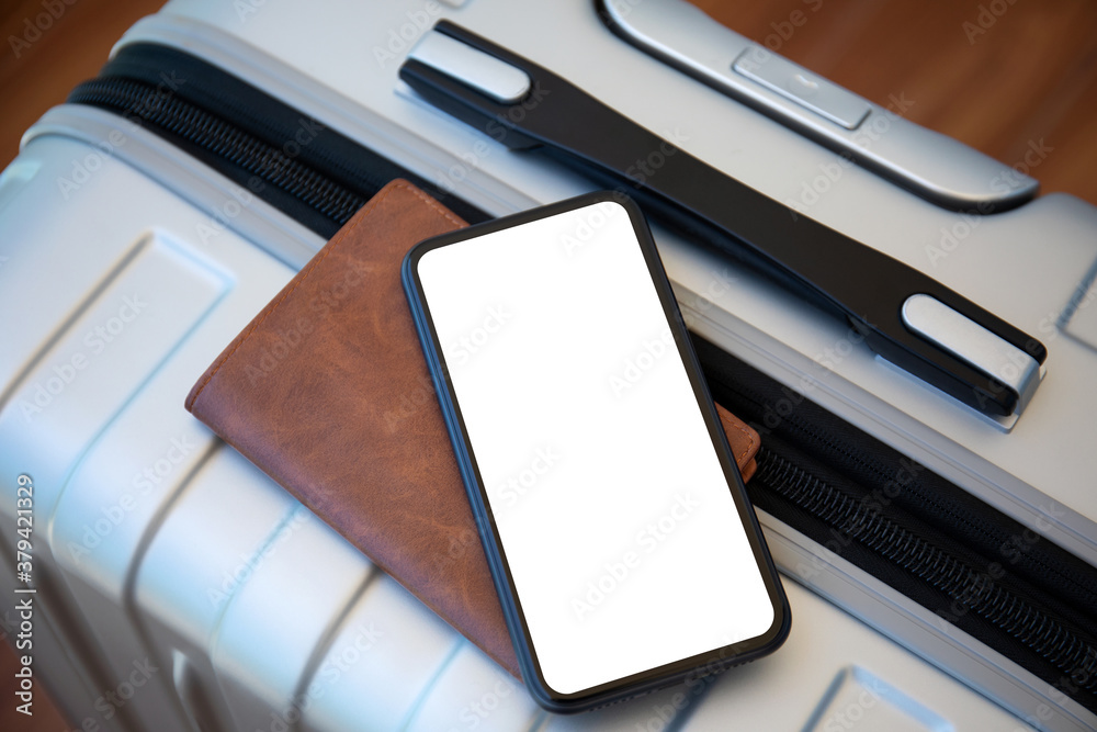 phone with isolated screen on suitcase at the airport Stock Photo ...