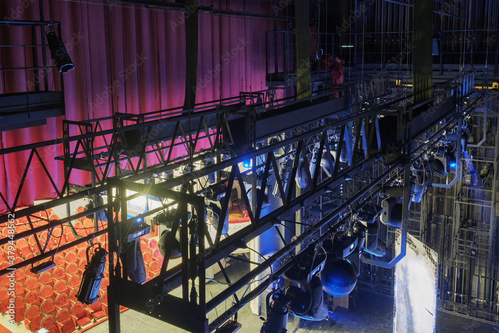 Technical equipment at the backstage of theater. Stage spot lighting ...