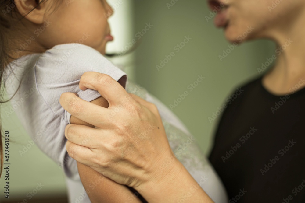 Angry mother yelling at her frightened child. Bad parenting and ...