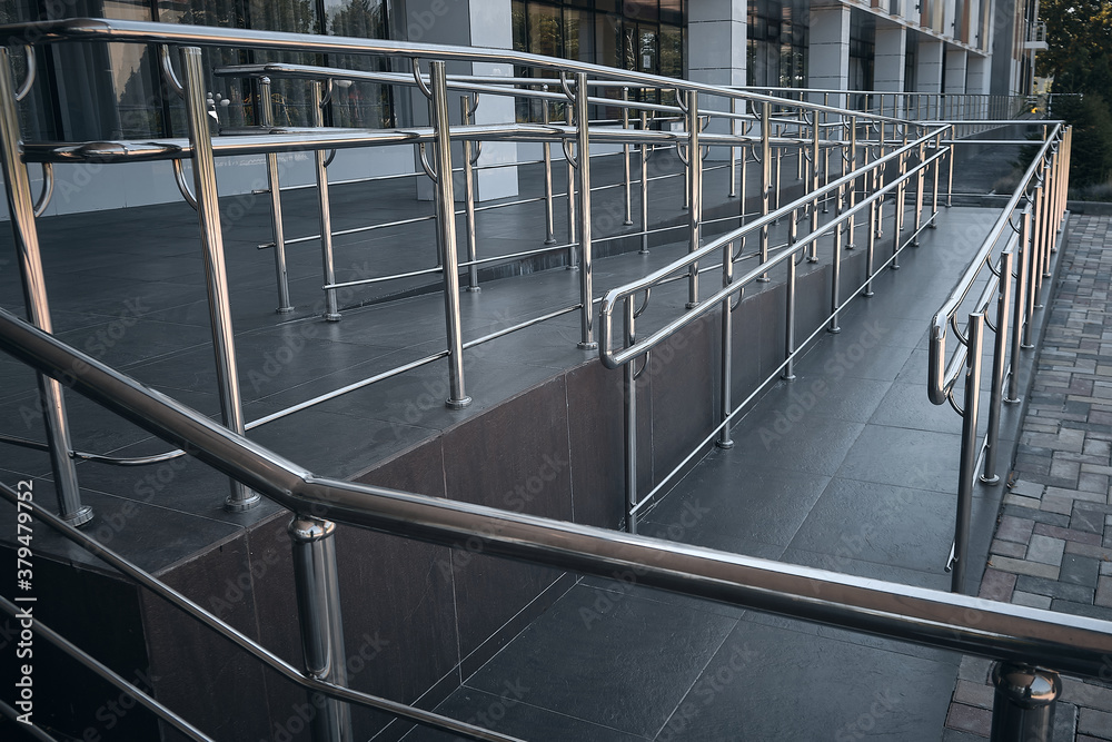 Ramp for people with disabilities and chrome railings Stock Photo ...