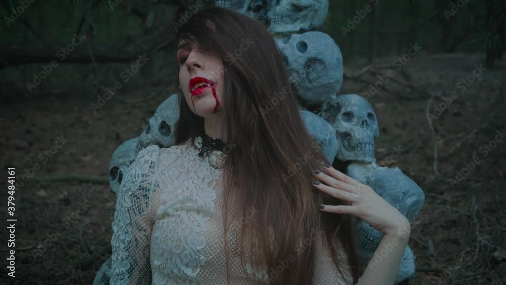 portrait of a young woman vampire, beautiful red lips with dripping ...