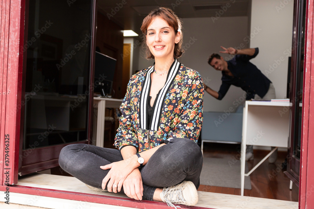 Horizontal portrait of a young attractive business woman after she ...
