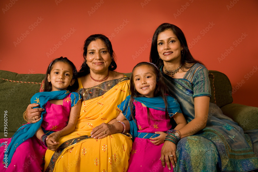 Multi-generational Indian family in traditional dress Stock Photo ...