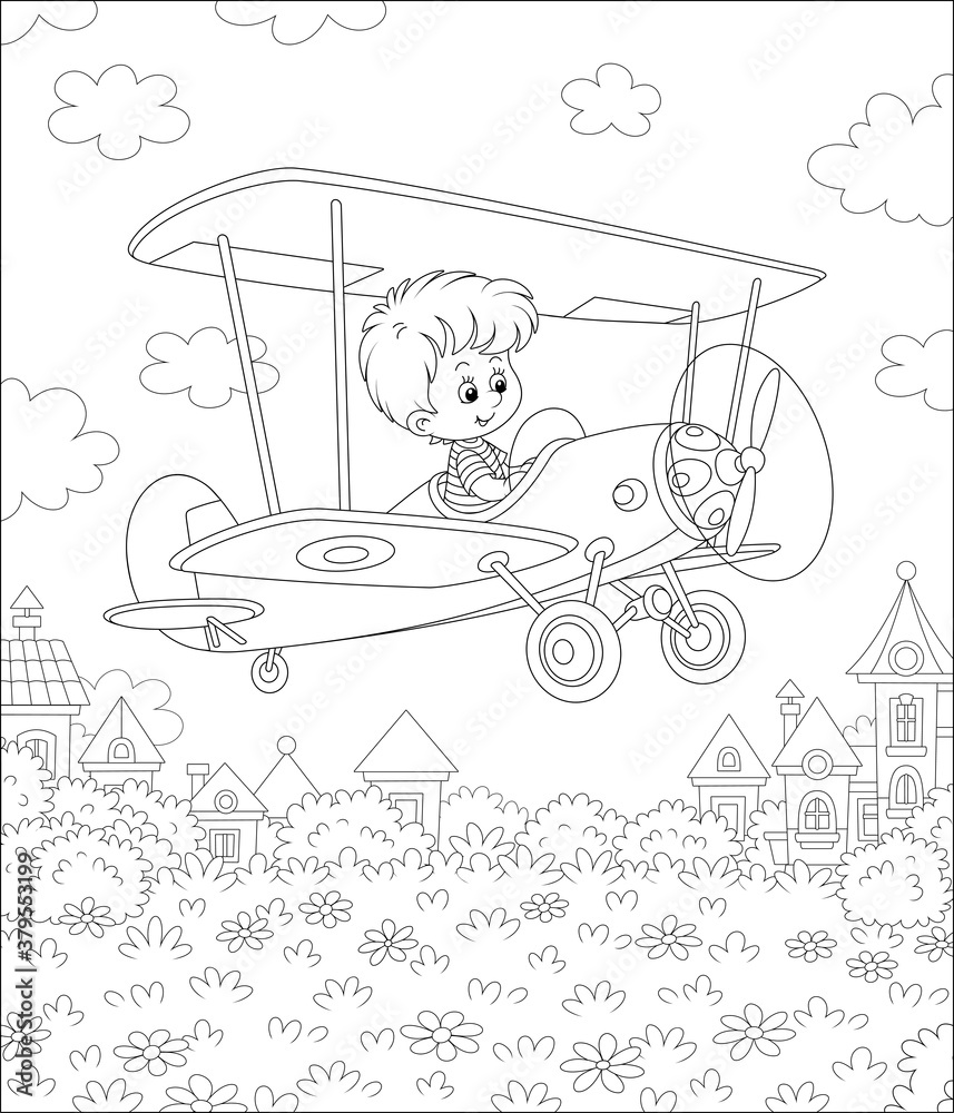Little cheerful boy piloting his small toy plane among clouds in summer ...