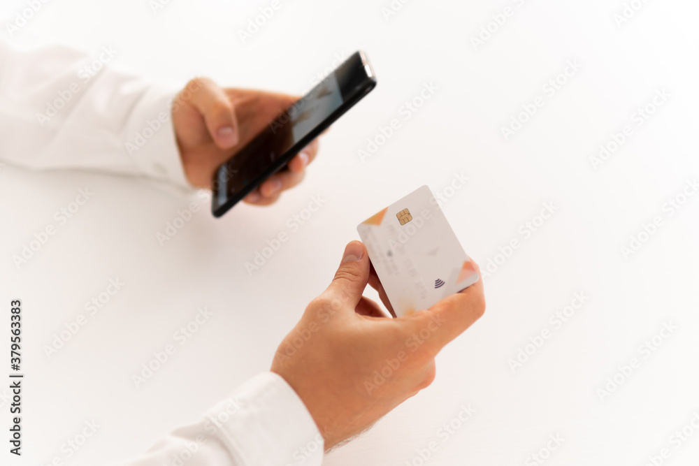 Foto de smartphone and holding credit card with social credit card and ...