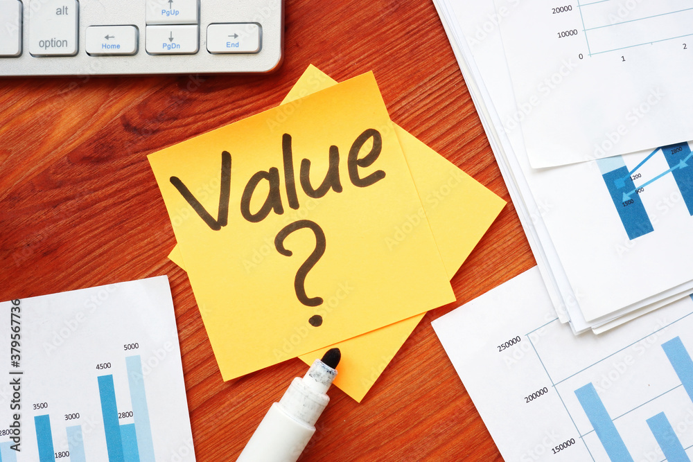 Word value and question mark on a memo stick. Stock Photo | Adobe Stock