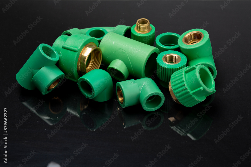 Plastic T-tube fittings on Black background, PVC Pipe connections, PVC ...