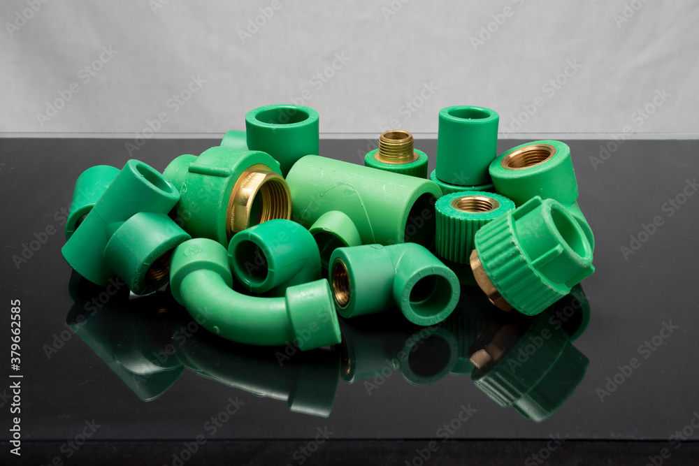 Plastic T-tube fittings on Black background, PVC Pipe connections, PVC ...