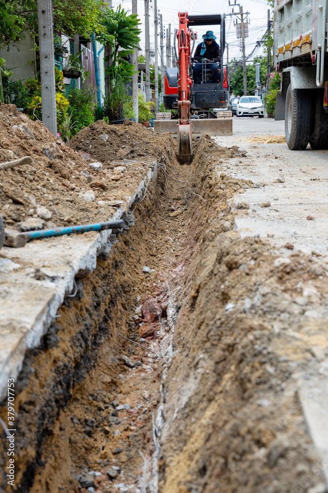 Digging road before install Pipe Water. Excavation water drainage at ...