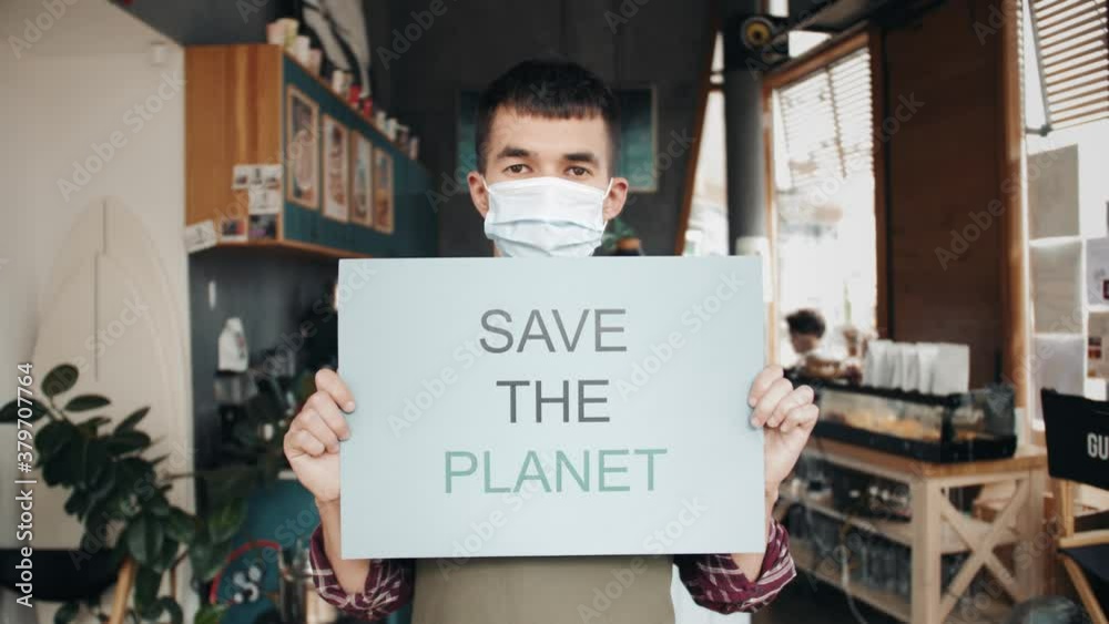 Handsome young protesting man guy hold protest sign broadsheet poster ...