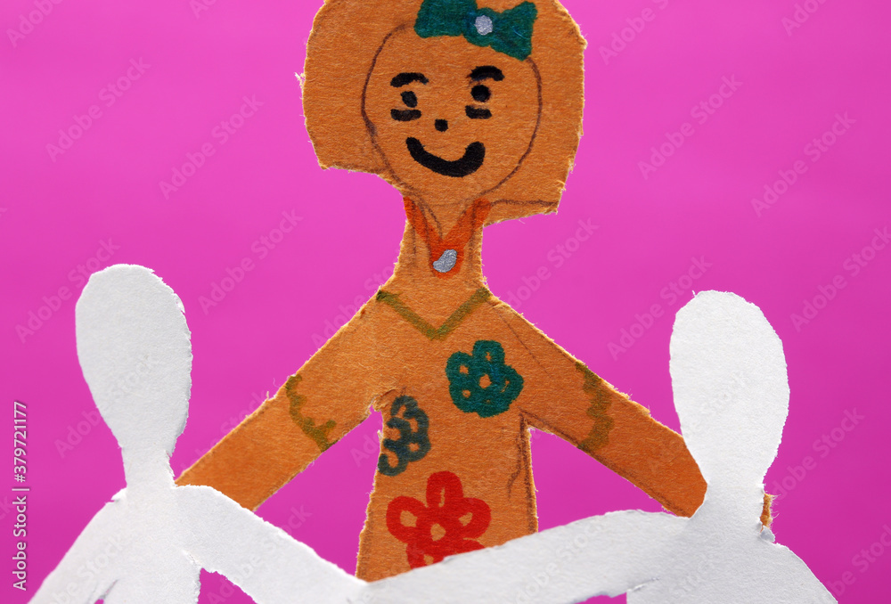 paper people holding hands together Stock Photo | Adobe Stock