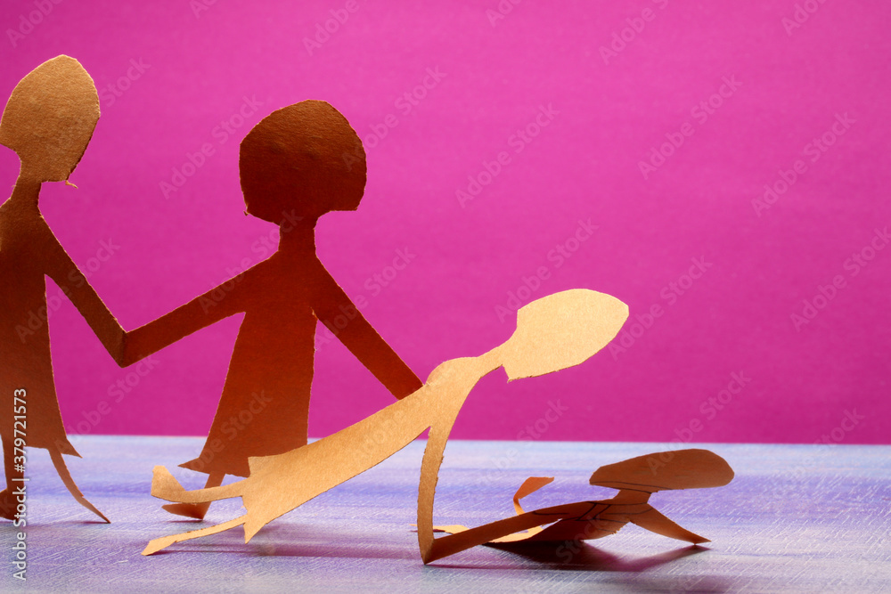 paper people holding hands together Stock Photo | Adobe Stock