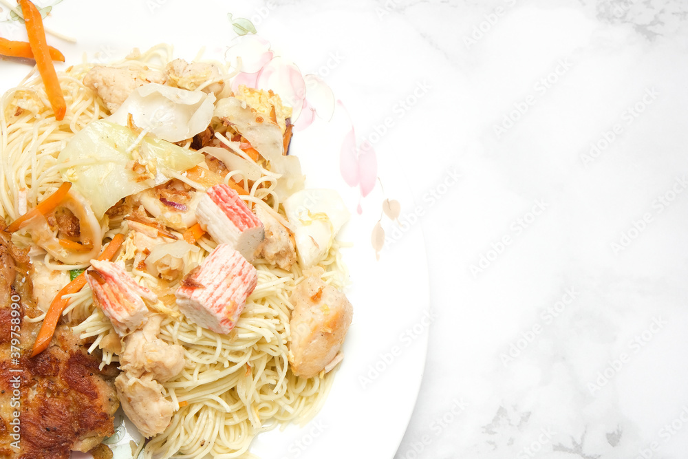 Close up picture of "mee raja" with chicken chop. "Mee raja" is "misua ...