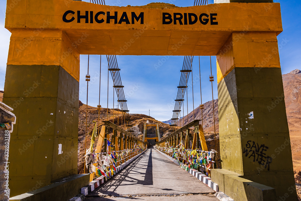 Chicham bridge is suspension stiffened steel truss bridge at altitude ...