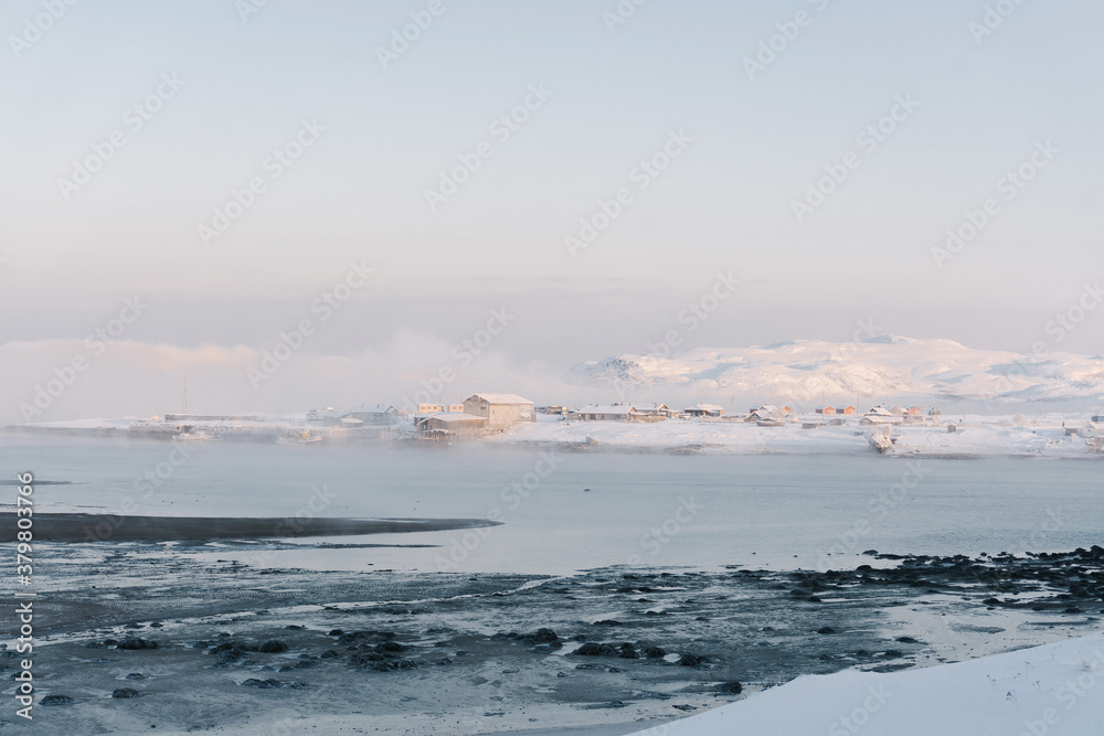 the snowy shore of the North Sea during low tide, the bottom becomes ...
