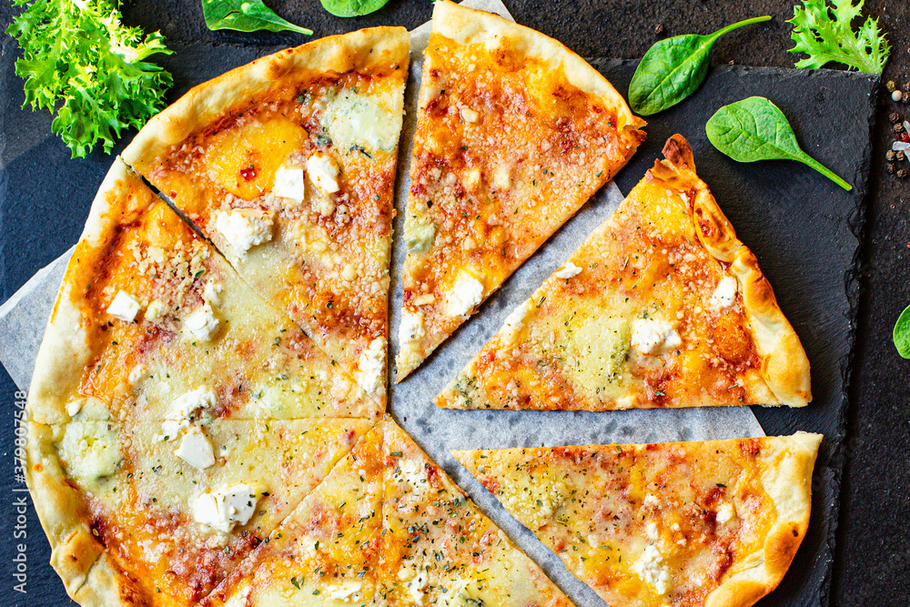 cheese pizza four types of cheeses and different varieties tomato sauce ...