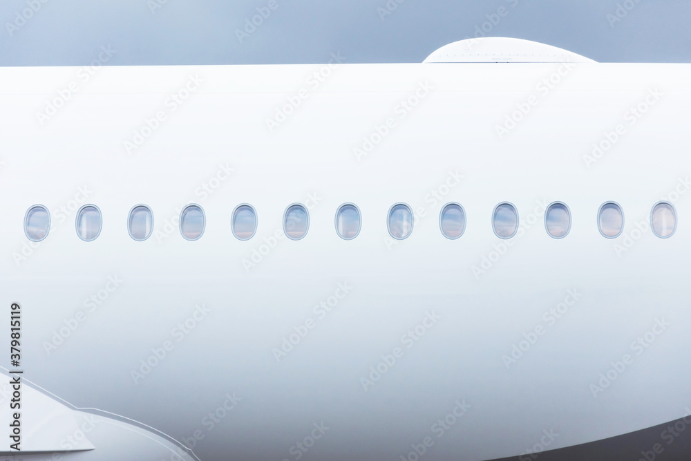 View of the fuselage of the aircraft and many windows, with wi-fi ...