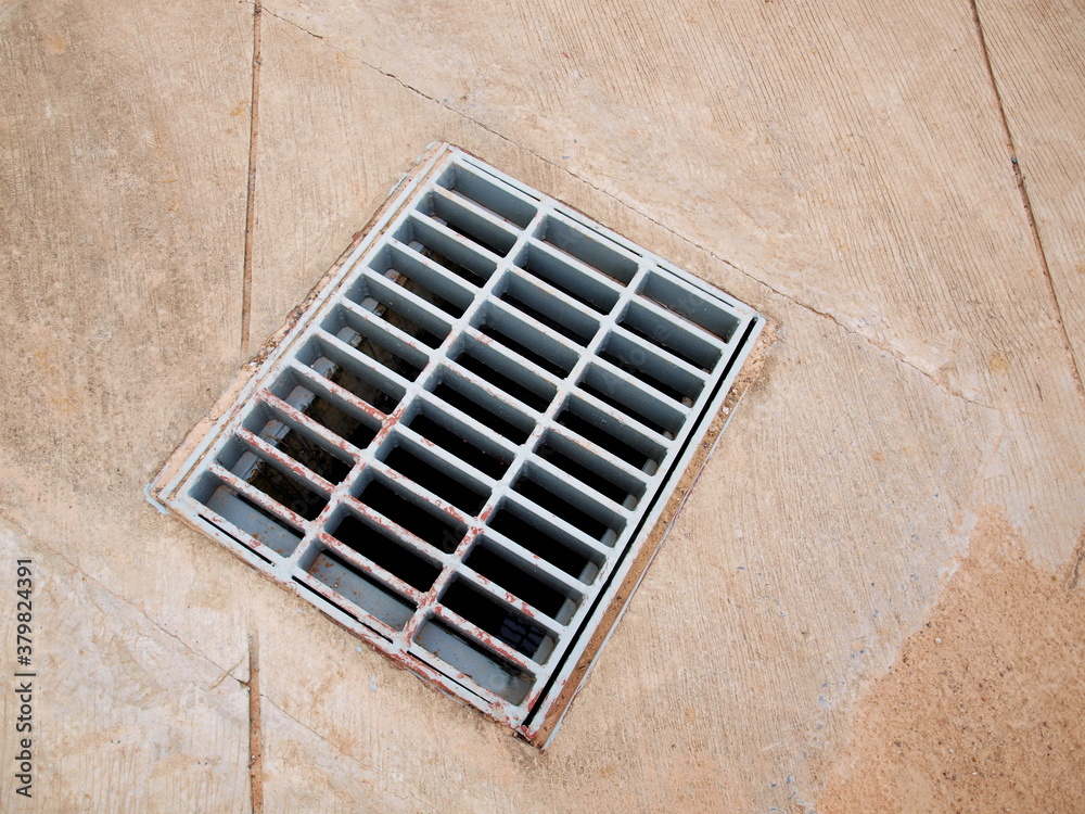 Metal Sewer Grid Manhole. A rectangular metal cover for preventing ...
