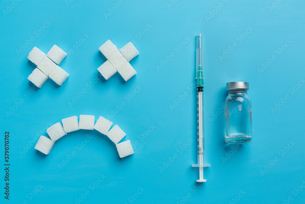 World diabetes day; sugar cubes are arranged in the shape of sad face ...