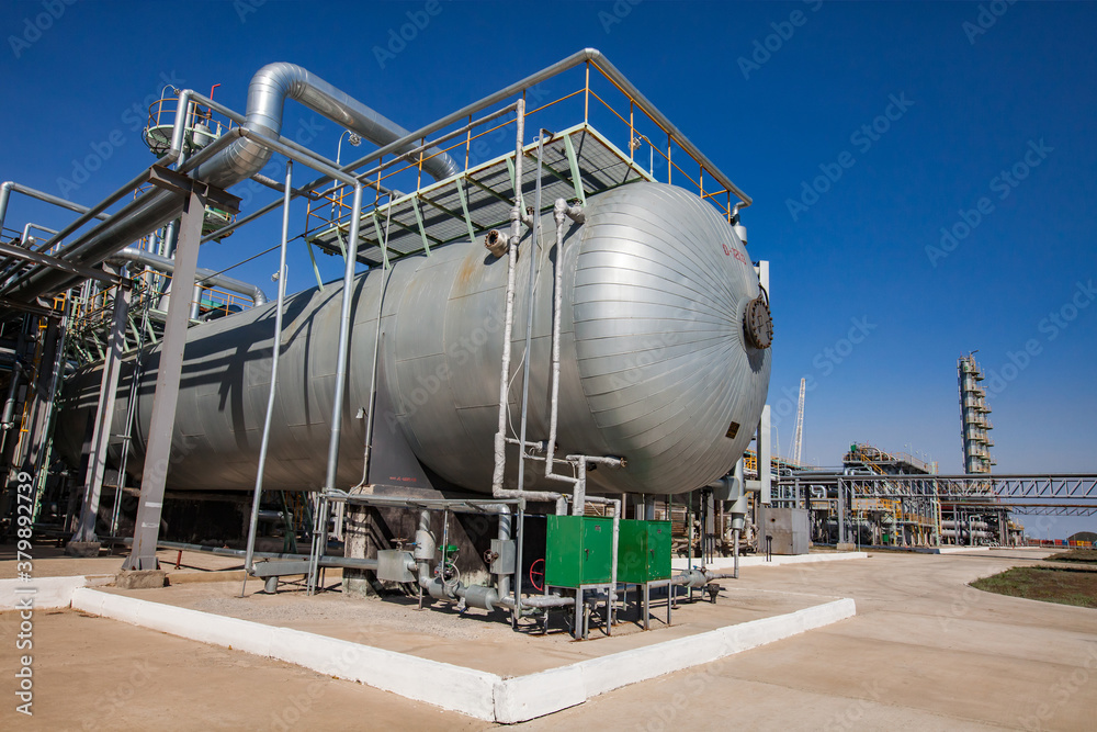 Petrochemical industry. Oil refinery plant in desert. Heat exchanger ...