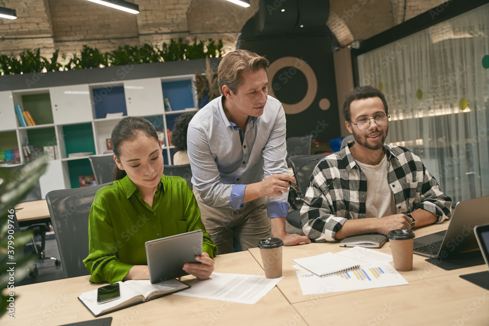 Successful multiracial business people working together in the modern ...
