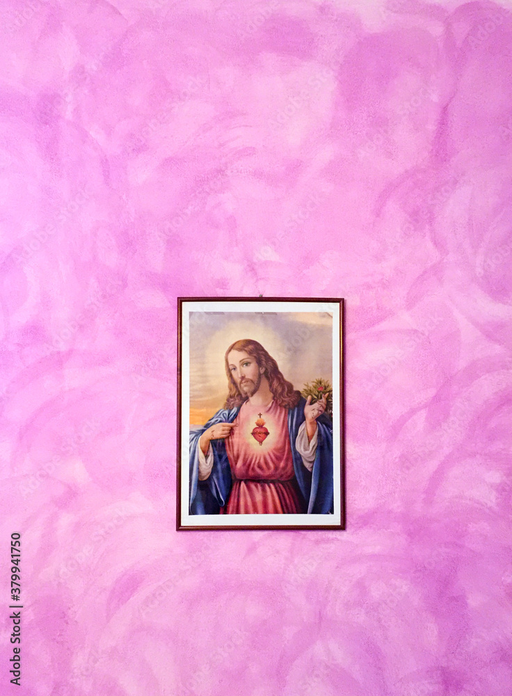Jesus on a pink wall Stock Photo | Adobe Stock