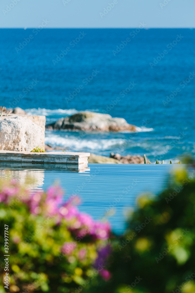 Edge Of Infinity Pool and View Of Ocean At Resort Stock Photo | Adobe Stock
