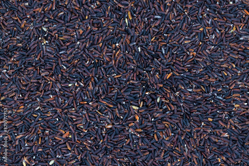 Black rice flat lay. Cereal photo texture. Diet healthy food ingredient ...