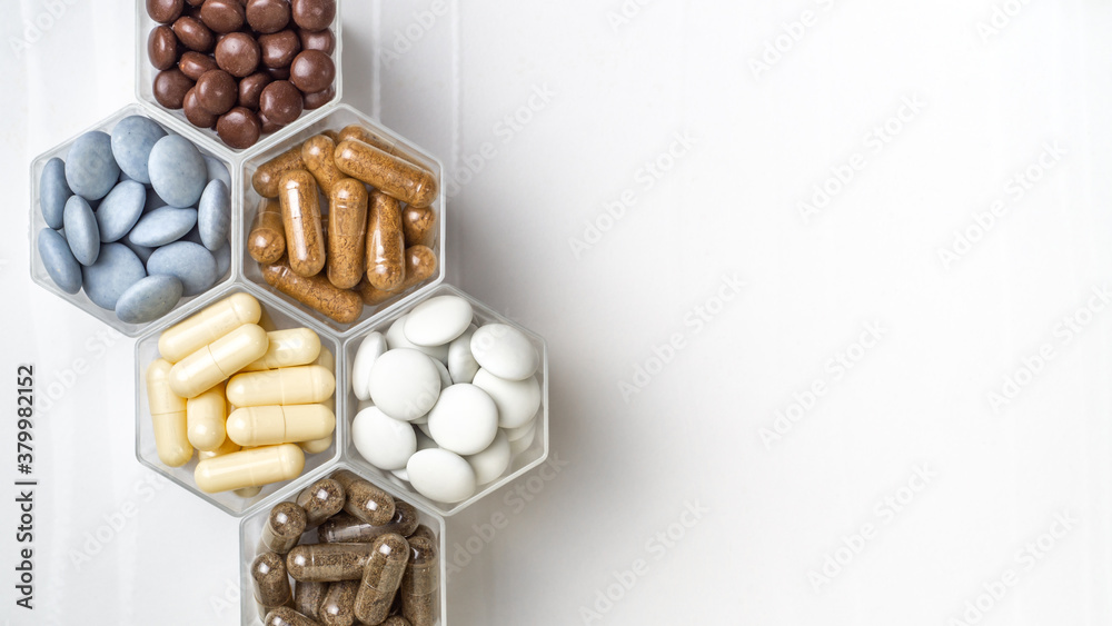 Poster Various capsules and pills with dietary supplements or medicines ...