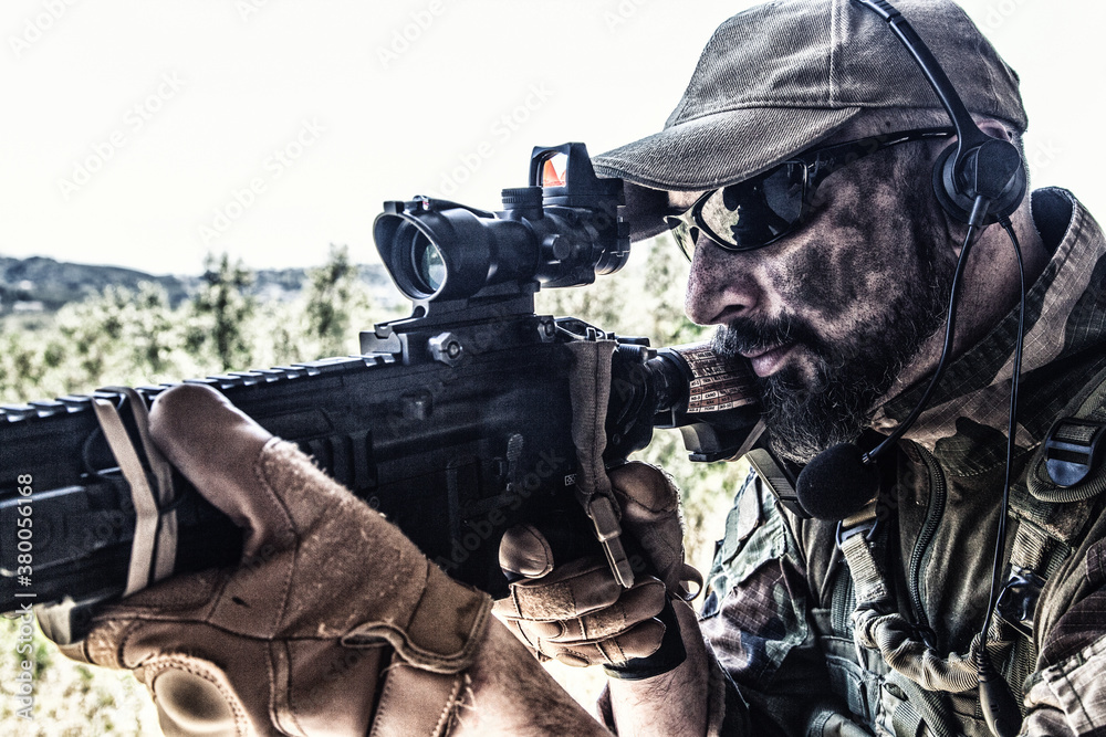 Army special forces soldier, modern combatant with dirty, unshaven face ...