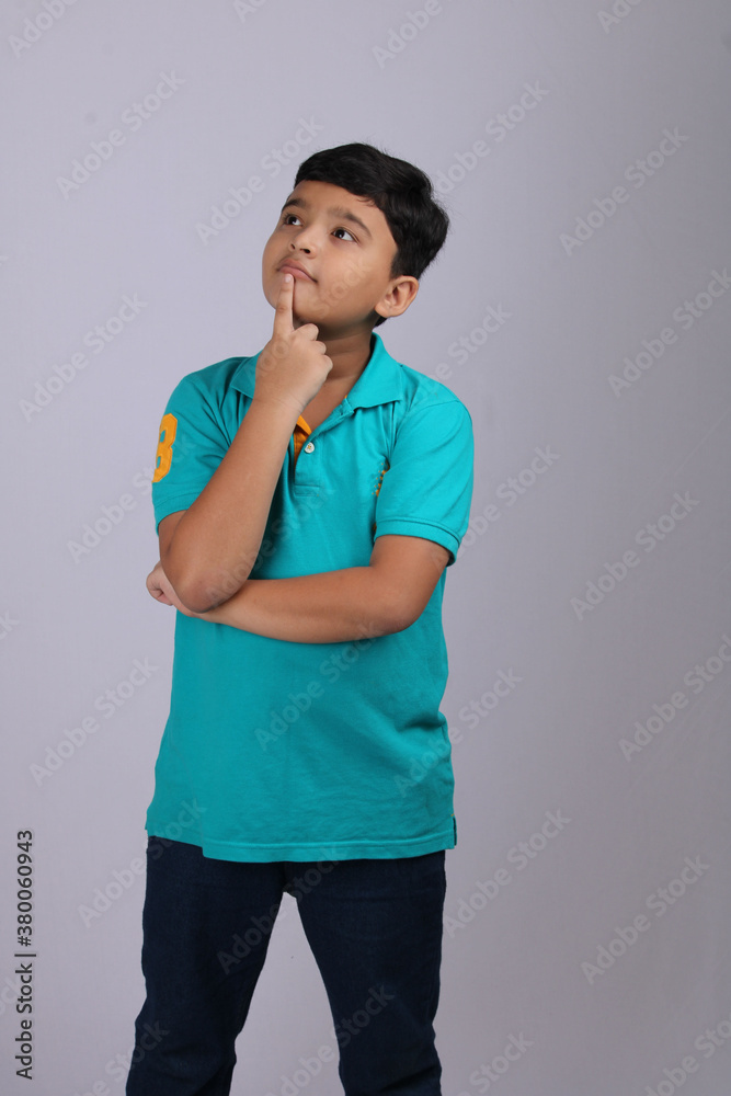 Thinking indian child deep in thought concept for confusion ...