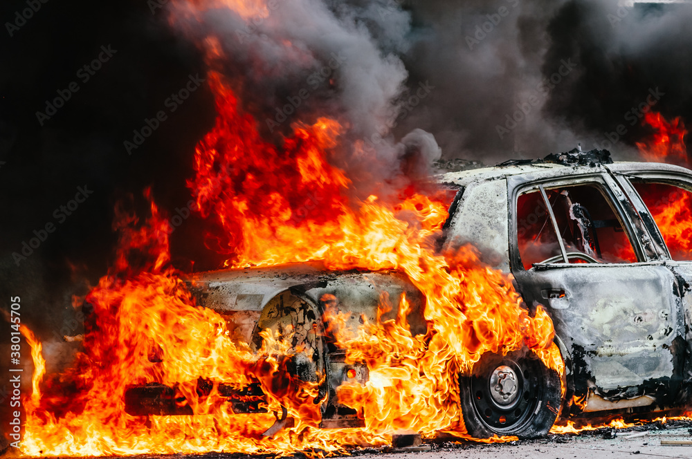 Burning police car Stock Photo | Adobe Stock