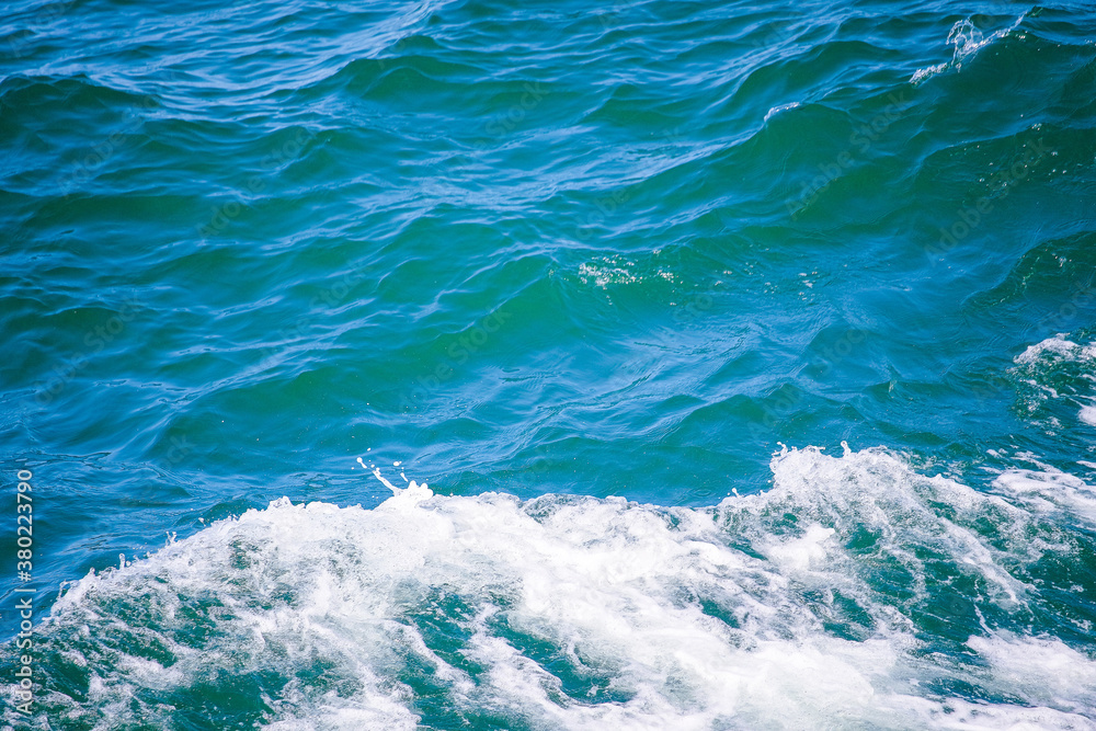 thundering ocean waves or waves on the sea with churned water or stern ...