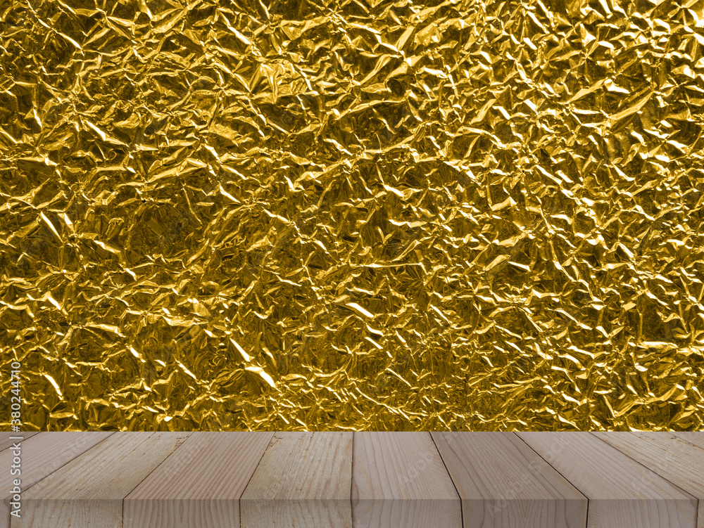wood table on gold aluminum foil texture background for product display ...