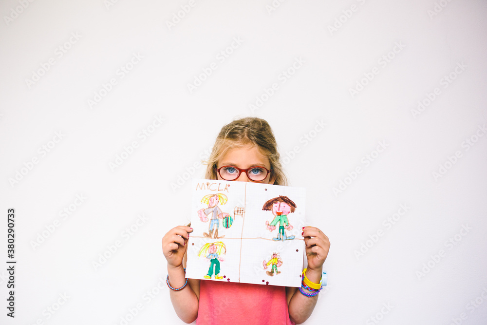 Little girl showing a drawing of her family made _ÔøΩ_ÔøΩby her Stock ...