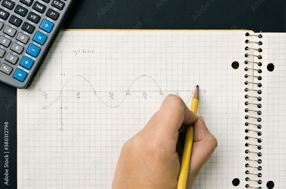 student drawing a trigonometry graph Stock Photo | Adobe Stock