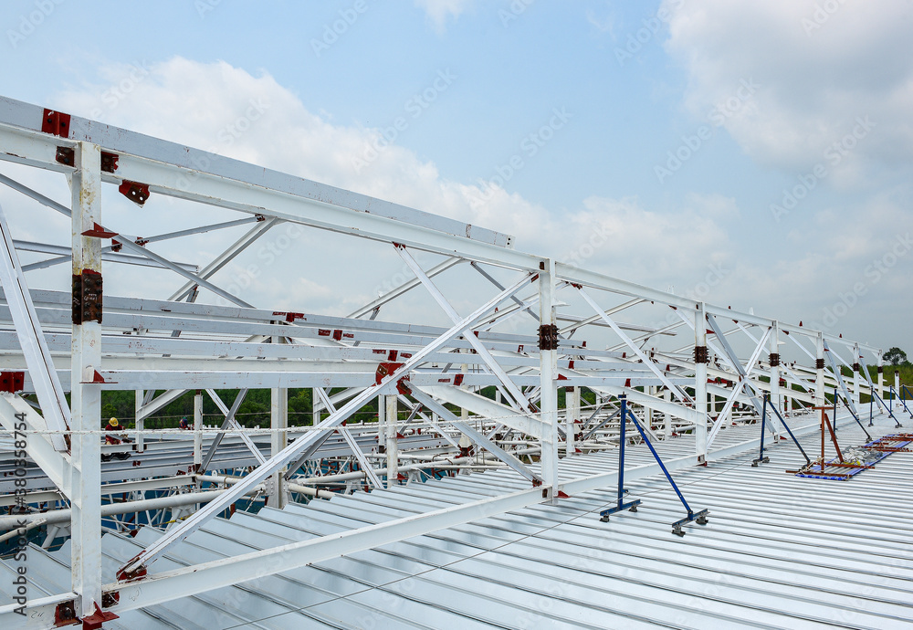 Steel structure roof monitor frame installation above roofing on new ...