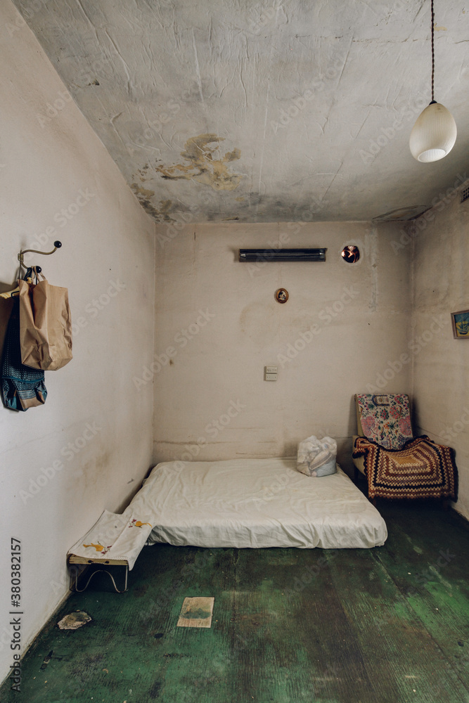 Shabby old room in house used by homeless person Stock Photo | Adobe Stock