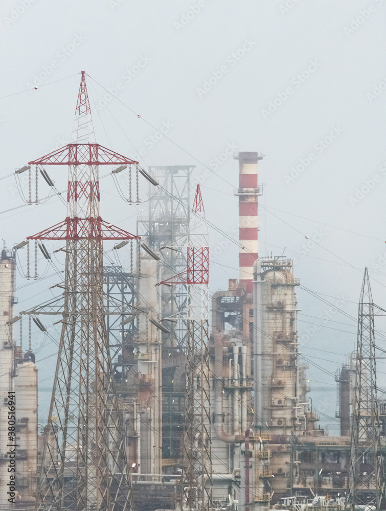 Oil and gas refinery, pipelines and towers, heavy industry Stock Photo ...
