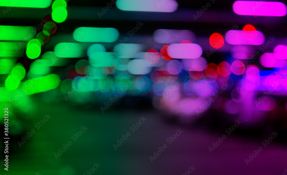 Blurred cars in car parking lot in shopping mall. Bokeh lights ...