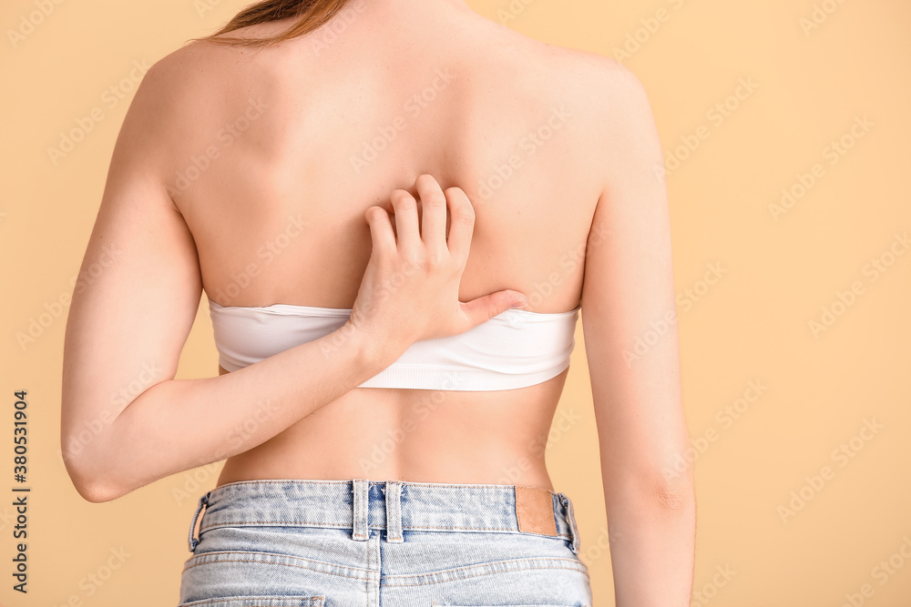 Young woman scratching her skin on color background Stock Photo | Adobe ... Young woman scratching her skin on color background Stock Photo | Adobe ...