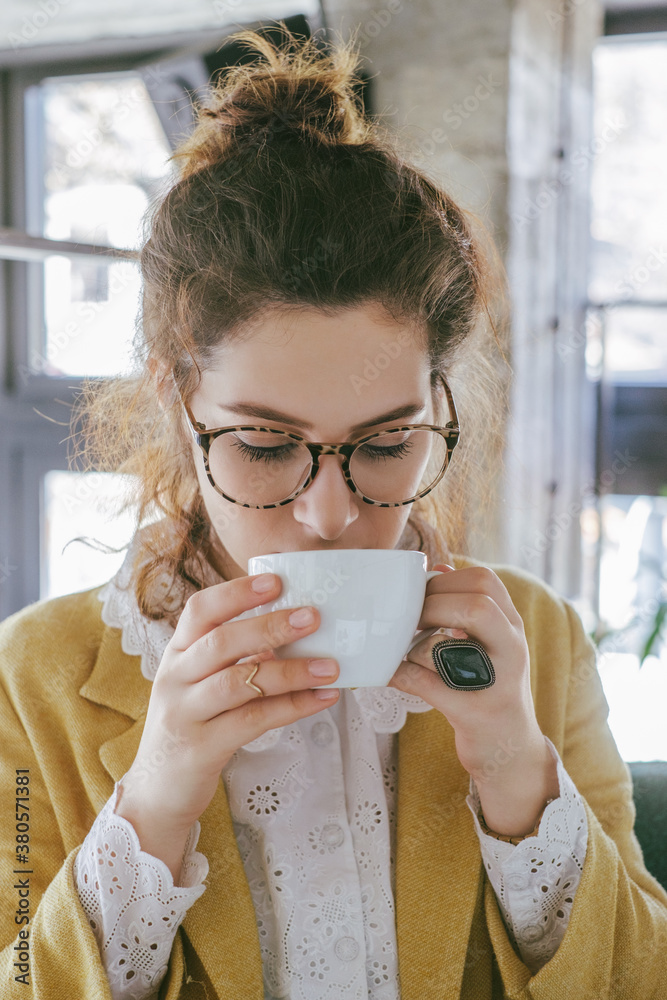 Beautiful Woman With Messy Hair Drinking Tea Stock Photo | Adobe Stock