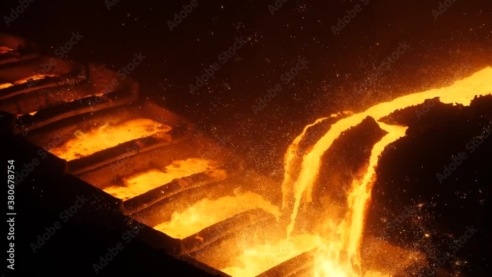 The scene of the smelting molten iron sparks in the blast furnace cast ...