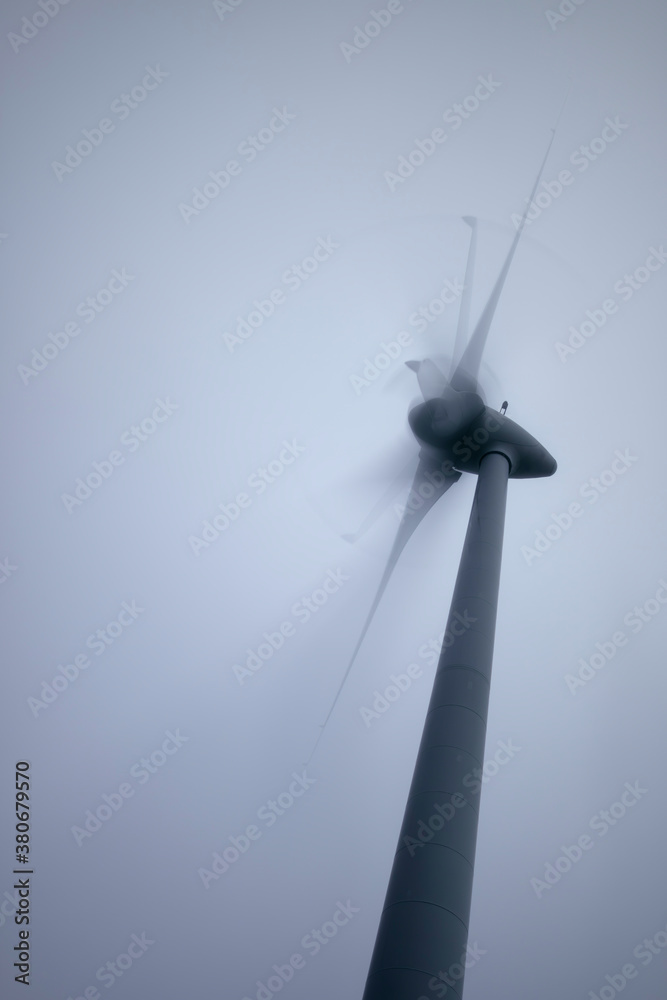 Wind turbine in movement Stock Photo | Adobe Stock