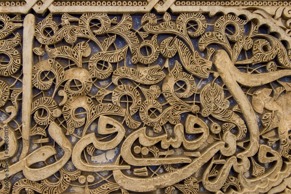 Detail of a wall with Arabic symbols in Alhambra Stock Photo | Adobe Stock