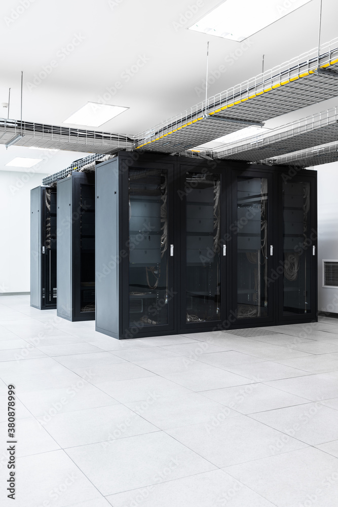 Servers in aisle of storage cabinets in data center Stock Photo | Adobe ...
