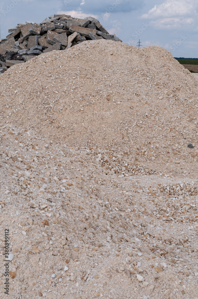 heaps of gravel and rubble at a construction site Stock Photo | Adobe Stock