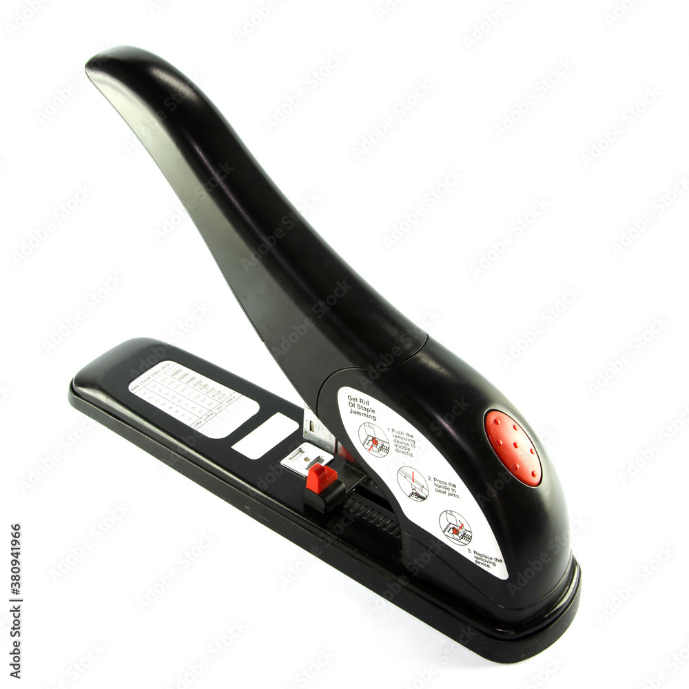 The stapler for binding books has a lever that forces the paper stacker ...